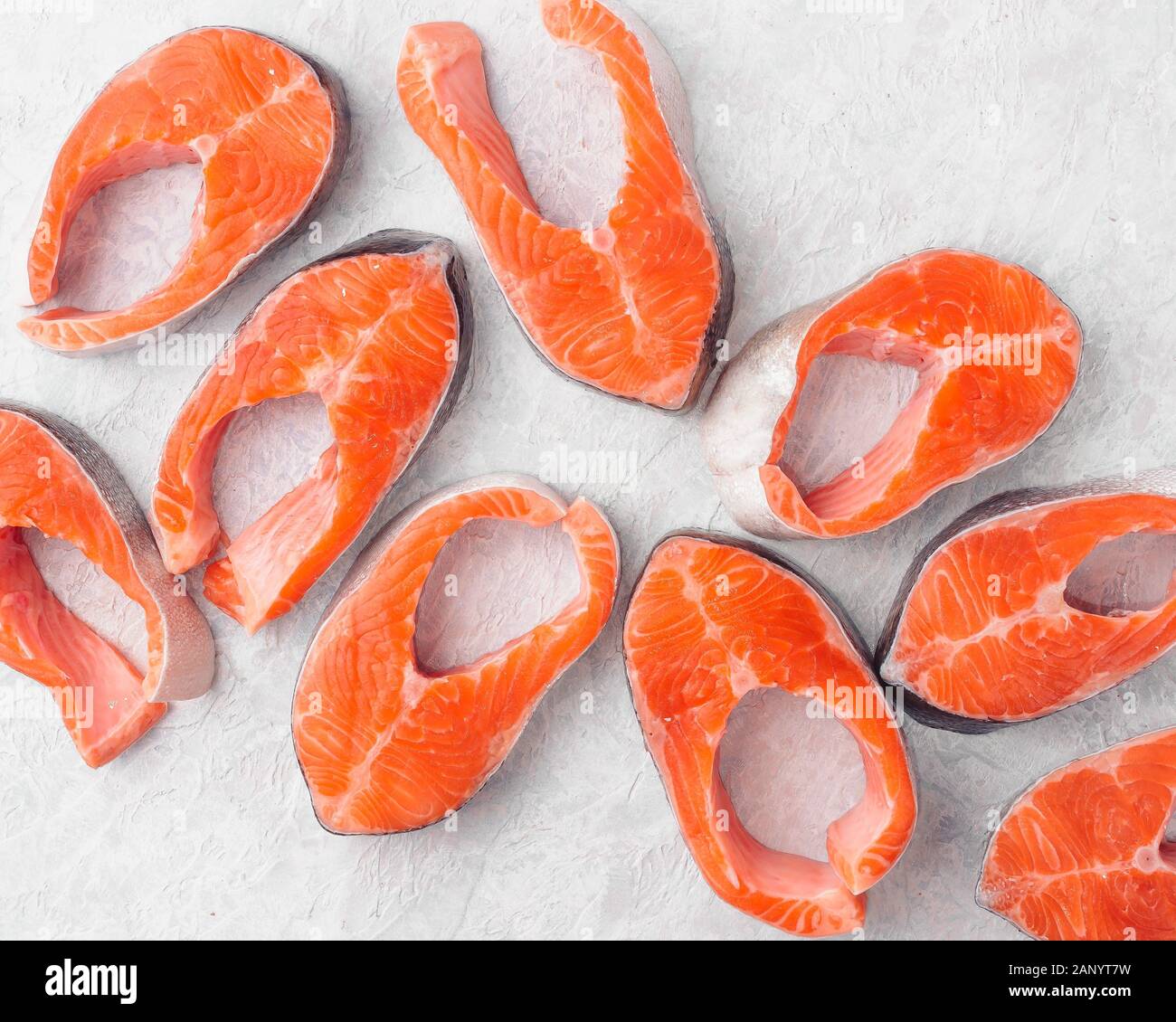 fresh uncooked red fish fillet over white Stock Photo - Alamy