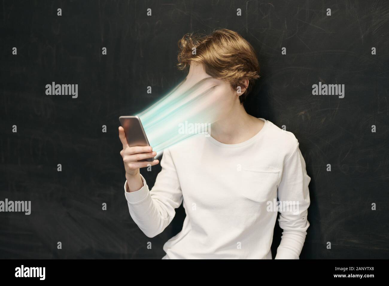concept about the use of technology and smartphones. An isolated girl ...