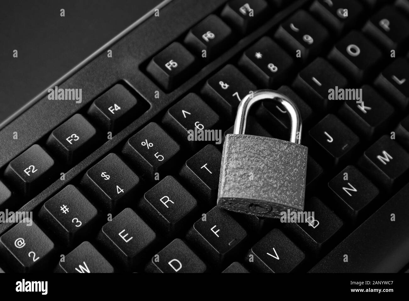 High angle shot of a lock on a black computer keyboard Stock Photo - Alamy