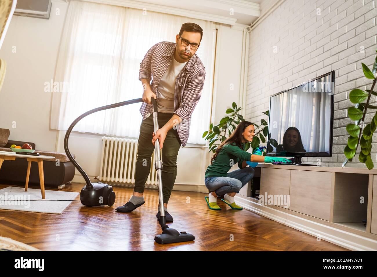 Husband wife cleaning hi-res stock photography and images - Alamy