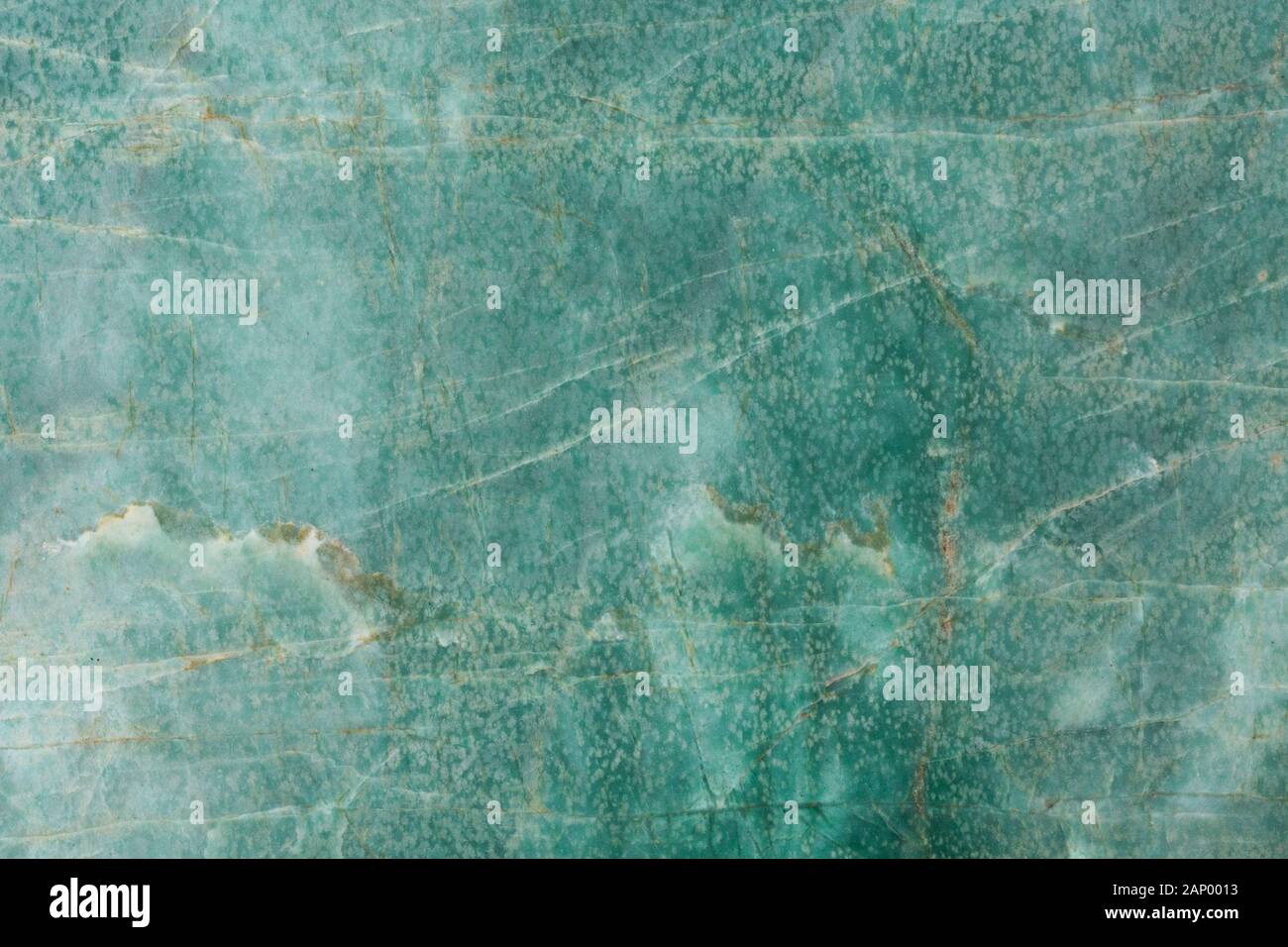 Light stone background in new green tone for unique design. High ...