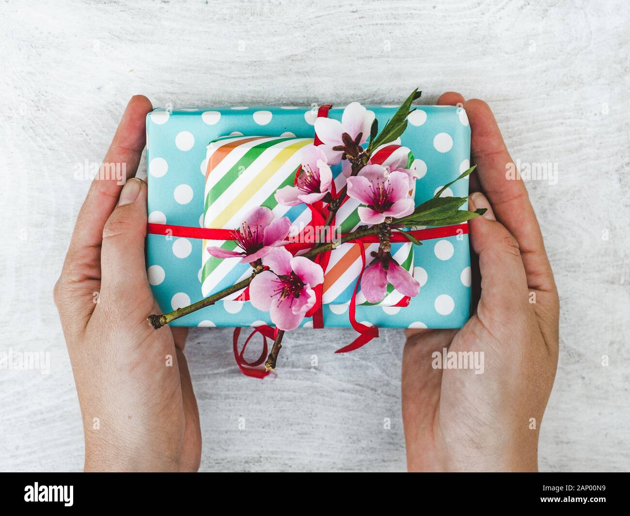 Gift Box, tied with a pink ribbon Stock Photo - Alamy