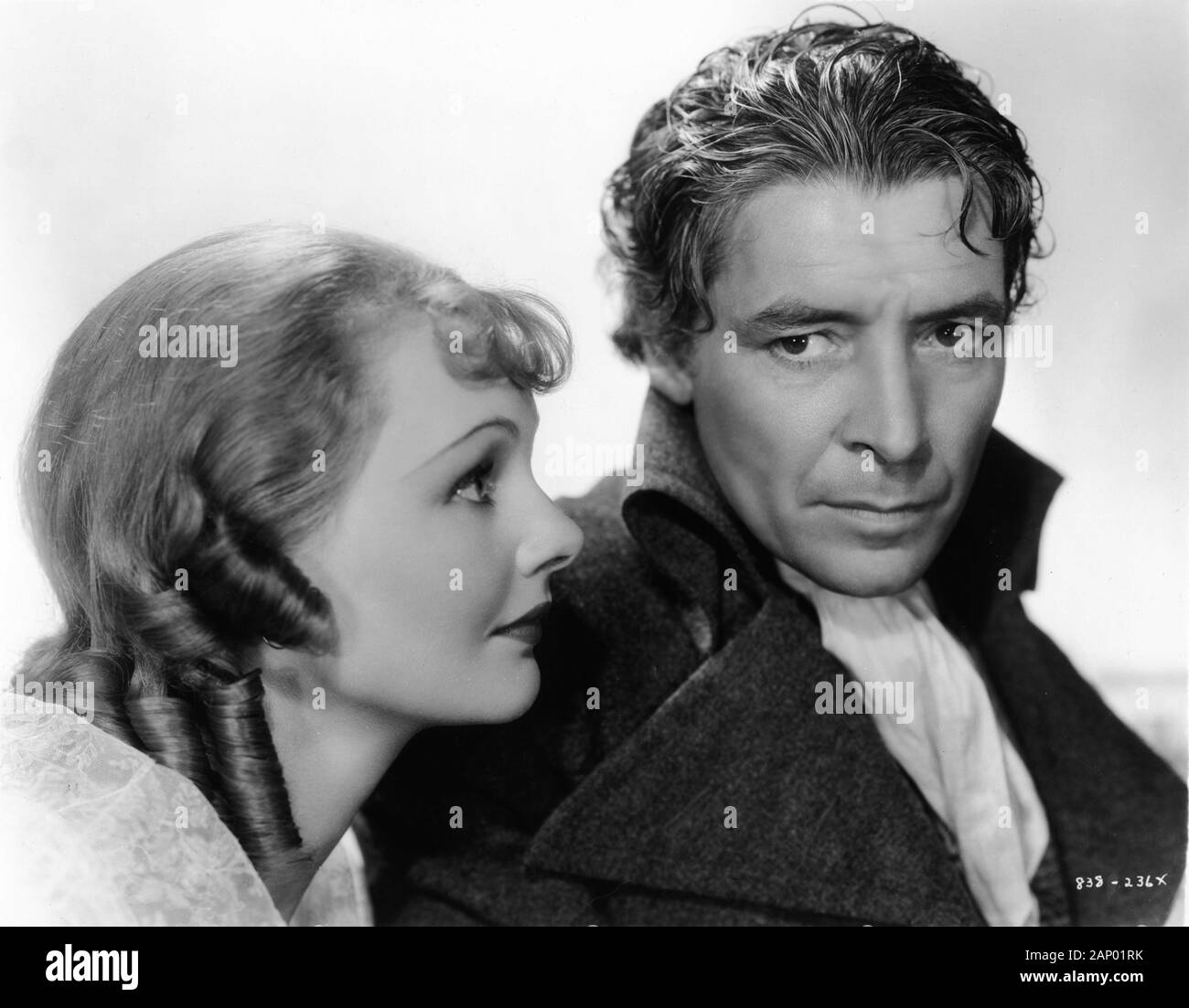 RONALD COLMAN as Sydney Carton and ELIZABETH ALLAN as Lucie Manette ...