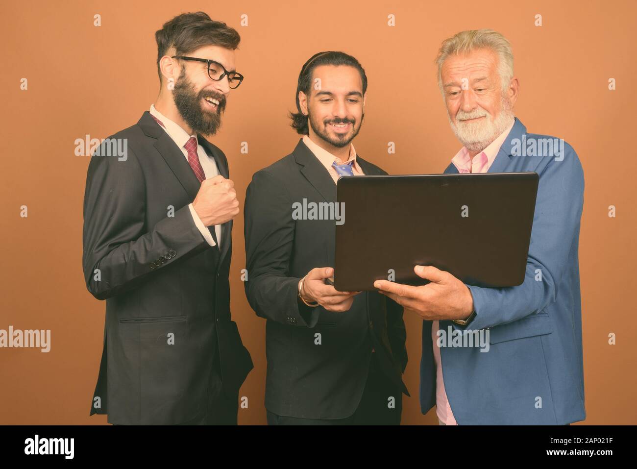 Businessman suit talking group three hi-res stock photography and ...