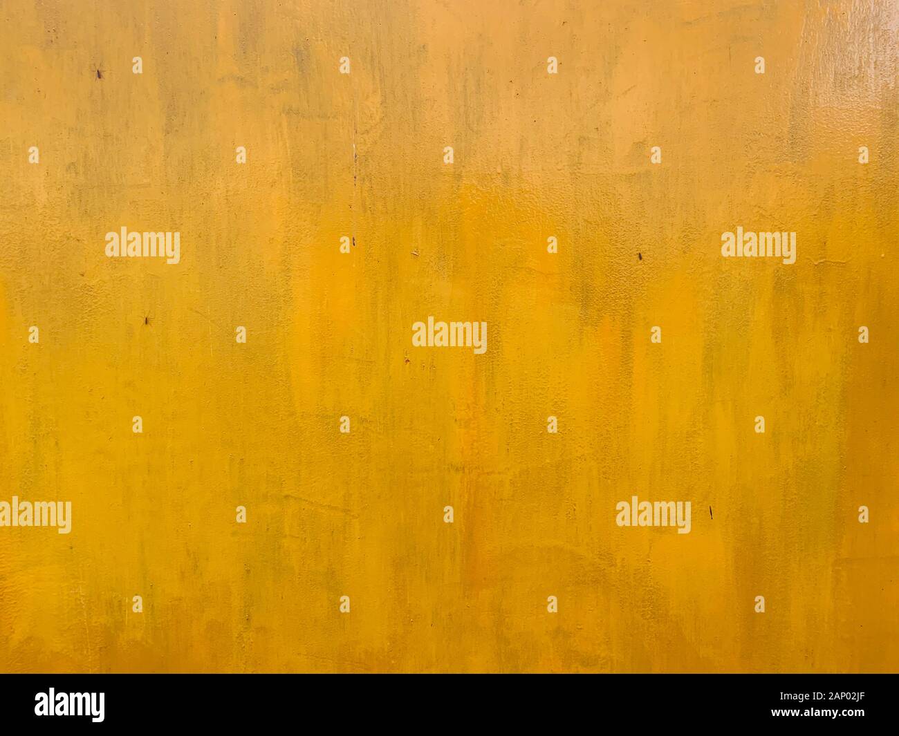 yellow vintage loft wall structure paint as background Stock Photo - Alamy