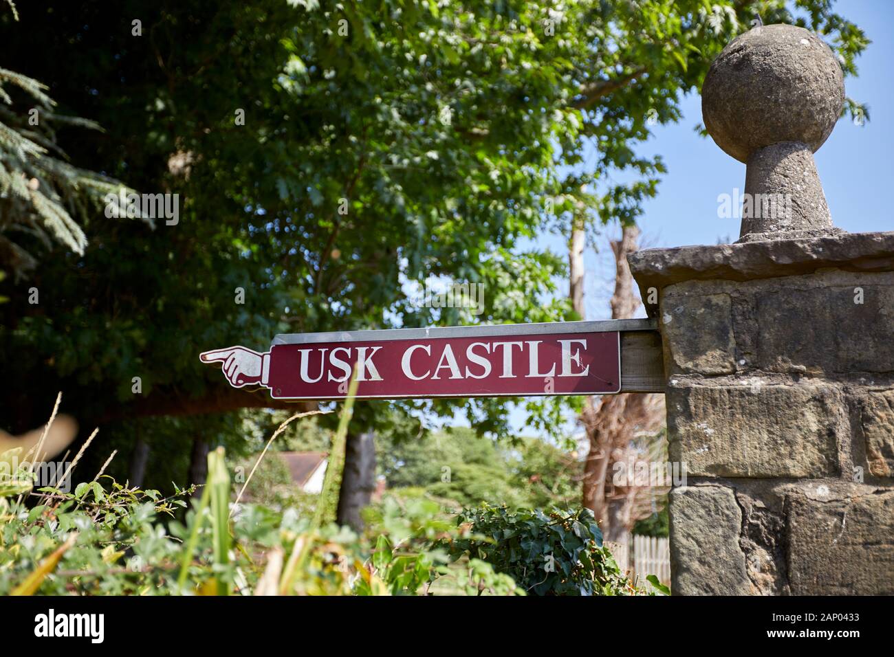 Usk Castle entrance sign Stock Photo - Alamy