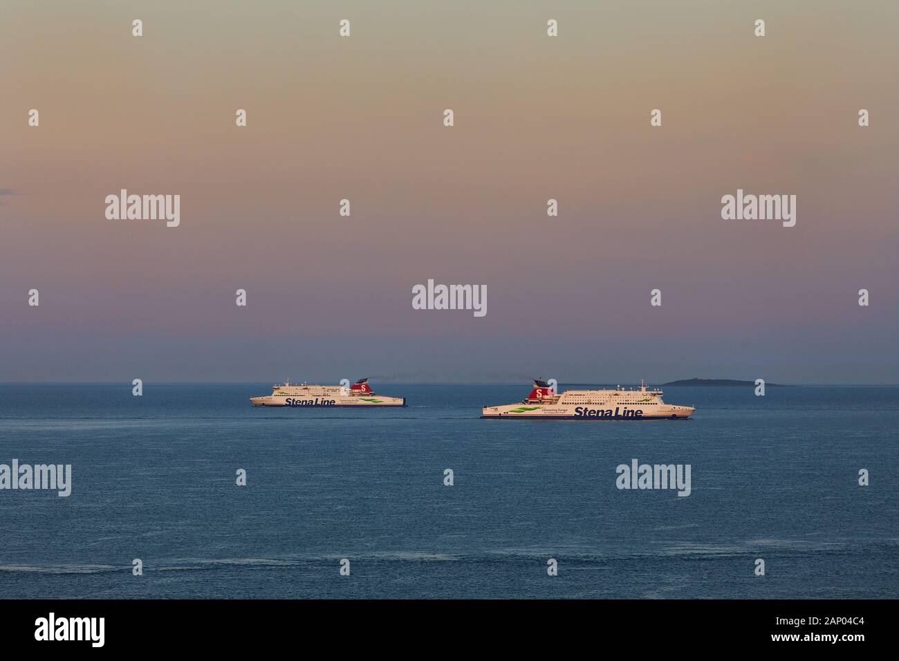 Stena Line car ferries cross Belfast Lough to Cairnryan at sunset ...