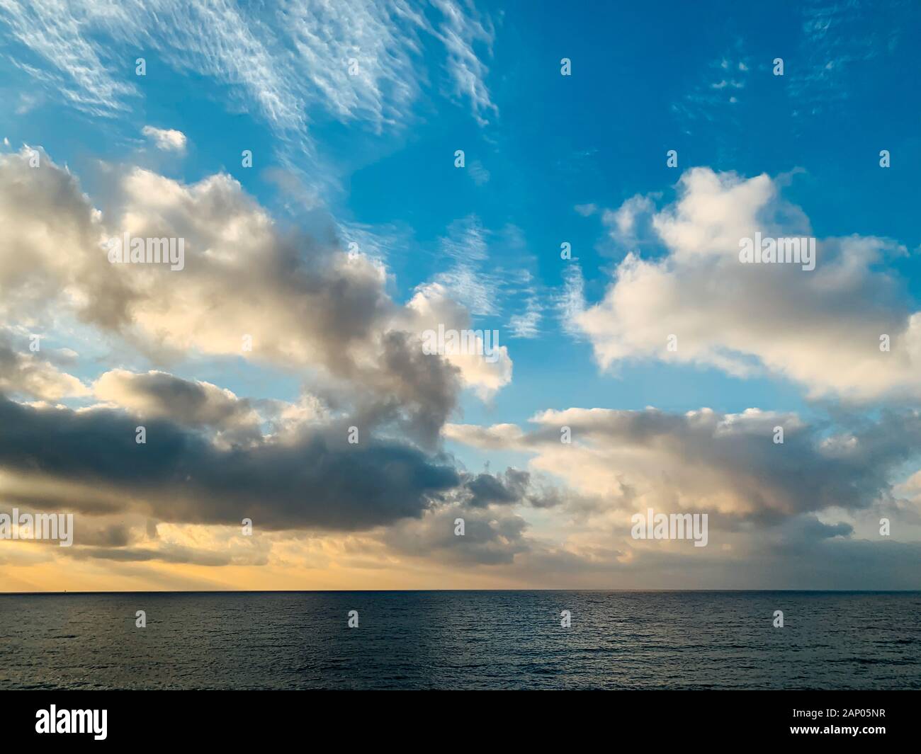 landscape of the sea horizon with sky with clouds at sunset Stock Photo ...