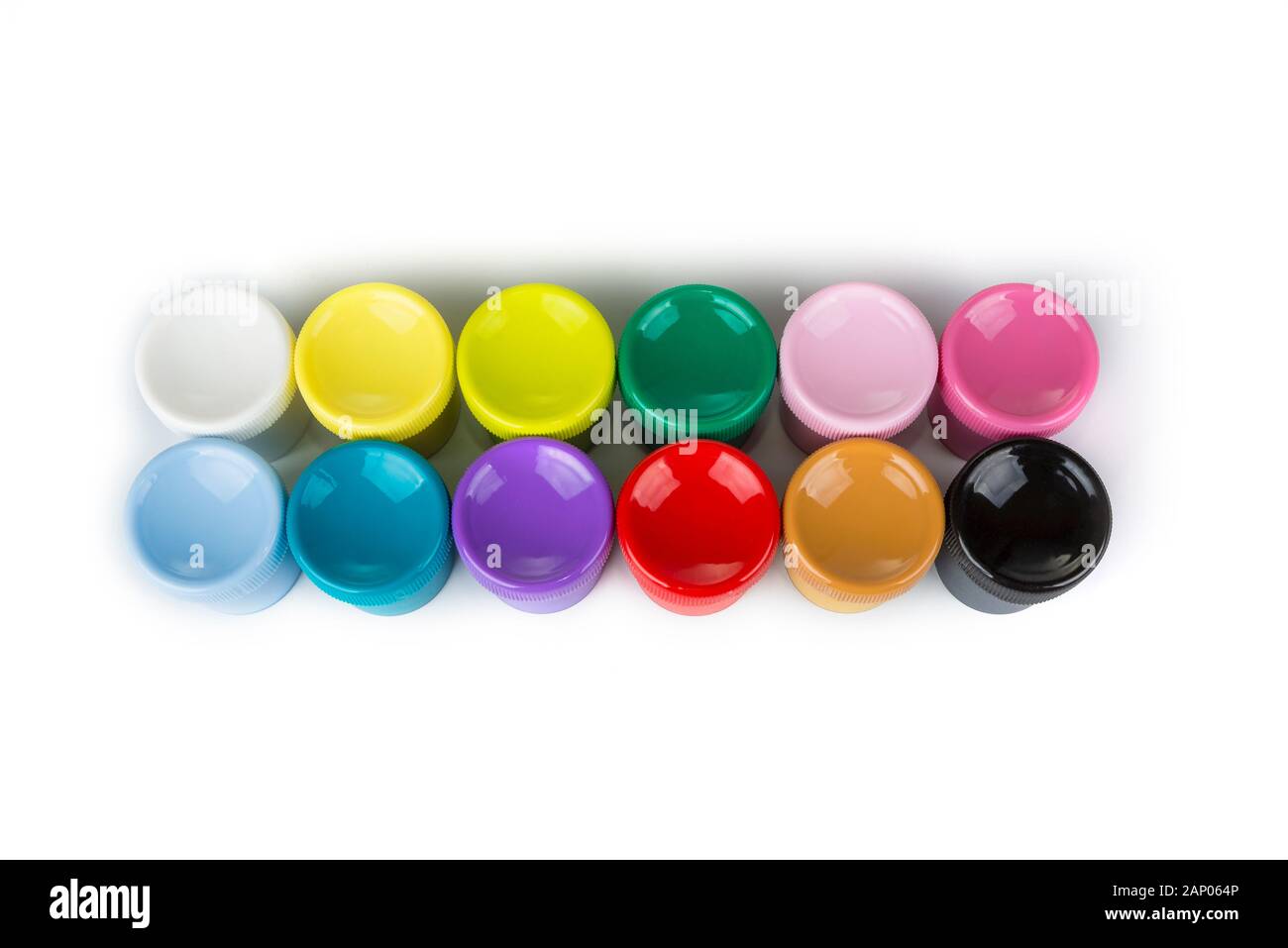 School paint in the plastic containers on a white background Stock ...