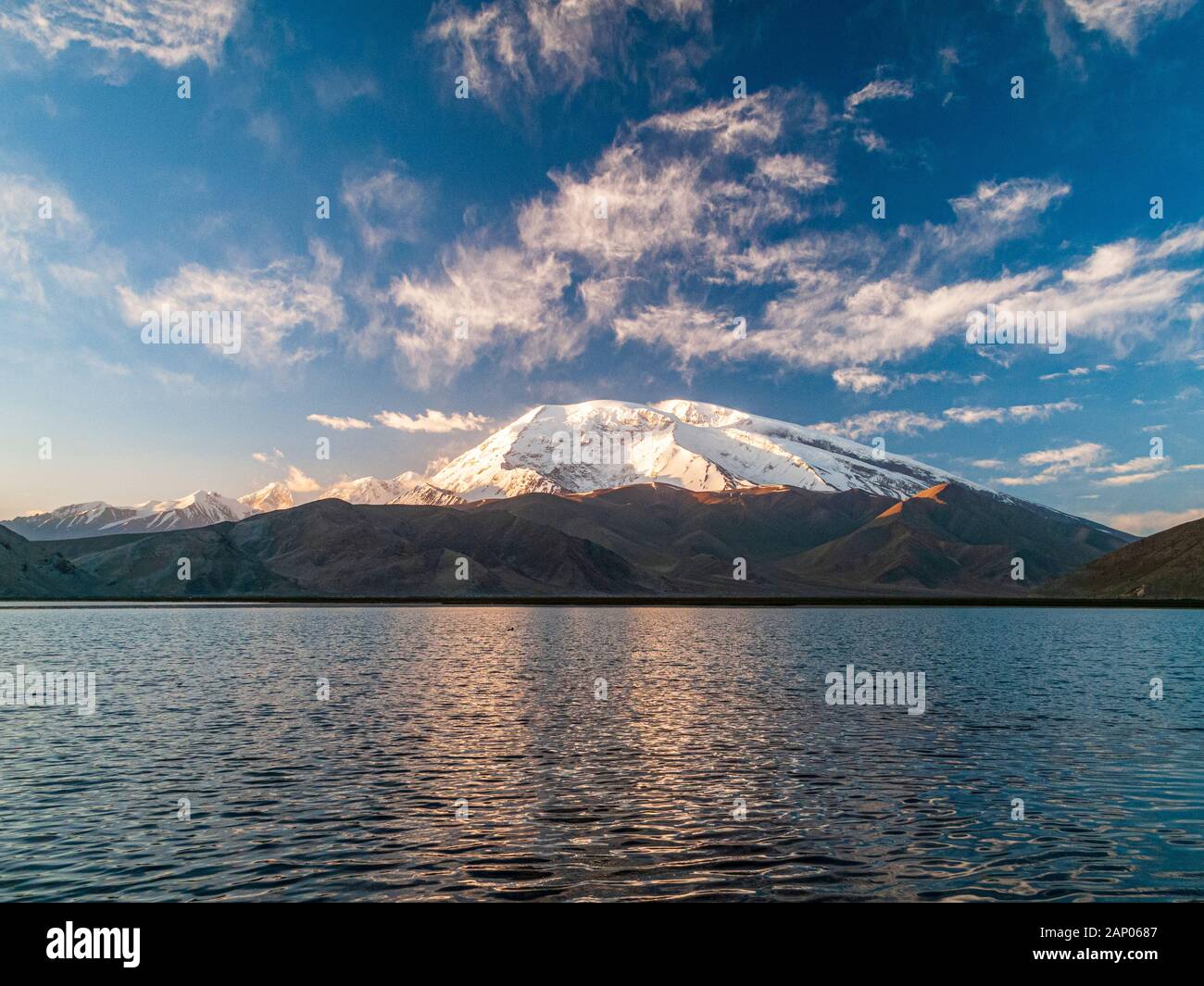 Karakuli Lake and Muztag Ata (7546m), one of the highest peaks in Pamir ...