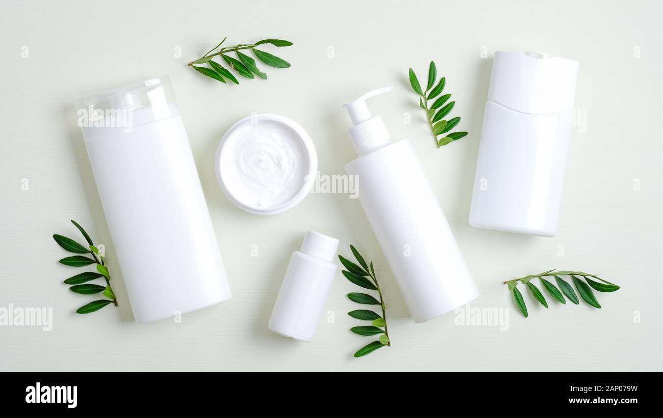 Set of SPA cosmetic containers and bottles branding mockup and green ...