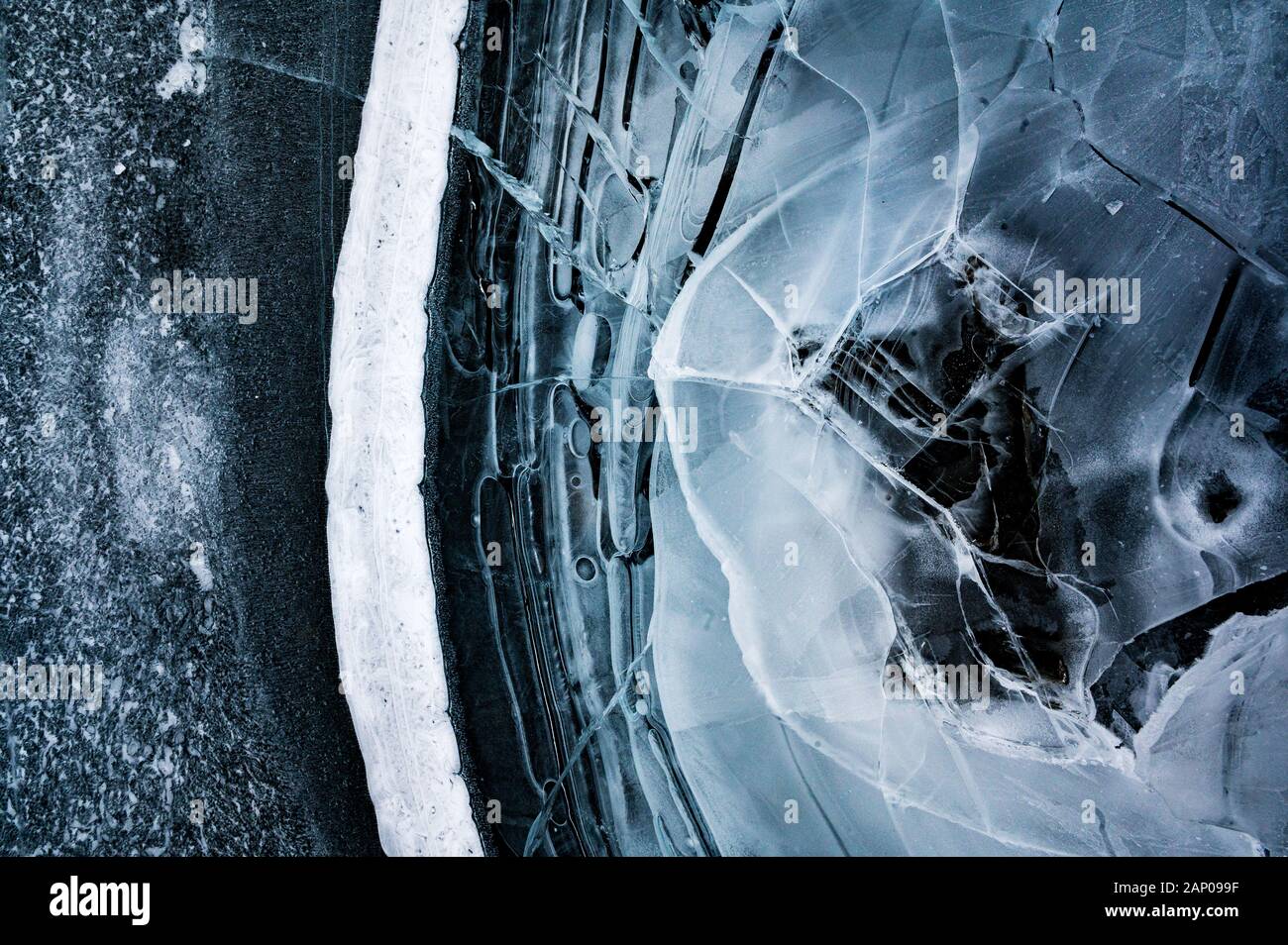 ice structure with a crack on a on frozen lake Stock Photo - Alamy