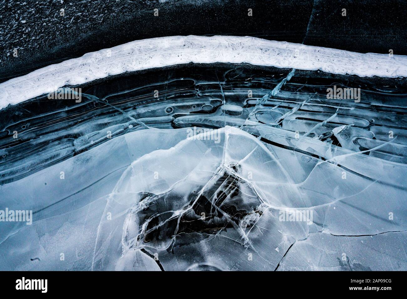 ice structure with a crack on a on frozen lake Stock Photo - Alamy