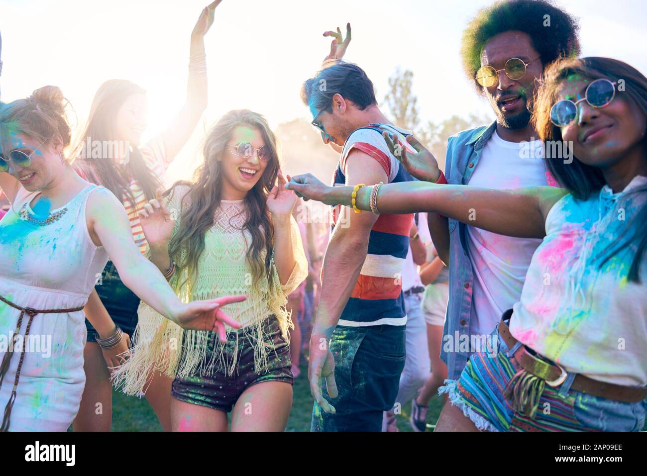 Group of friends dancing outdoors Stock Photo - Alamy