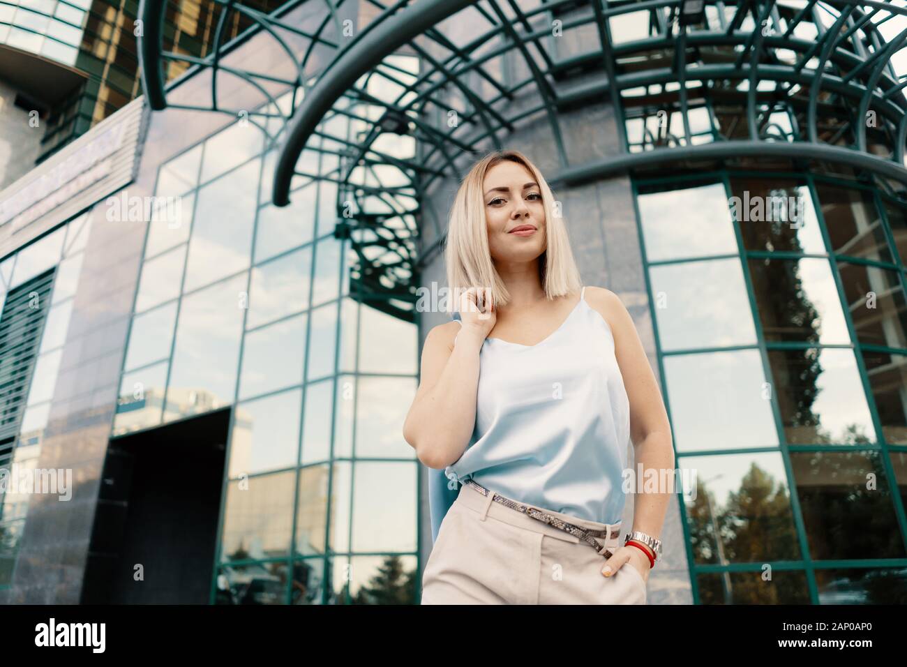 Successful business woman in blue suit. Beautiful young female ...
