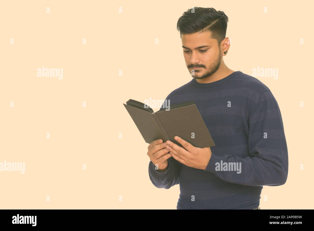 Man reading book face hi-res stock photography and images - Alamy