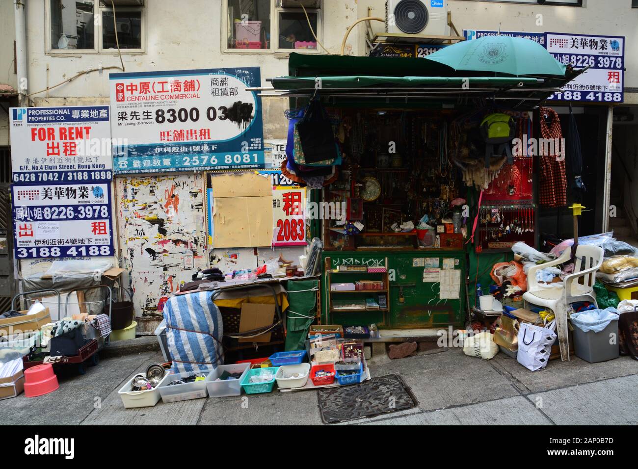 A trashy looking kiosk in a street market in the Tai Ping Shen ...