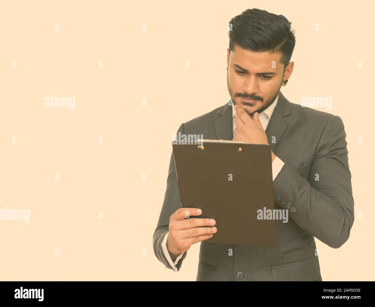 Attractive indian man read hi-res stock photography and images - Alamy