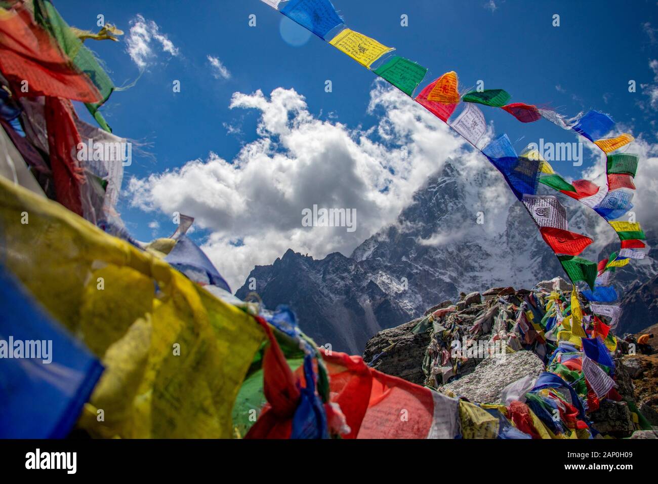 Prayer flags dazzling in the wind in the Himalaya mountains in Nepal ...