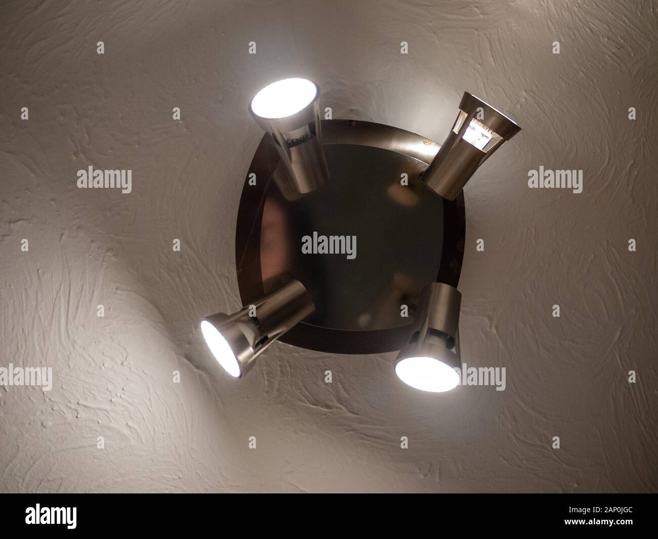 Four way lights above on ceiling bright inside; England; UK Stock Photo ...