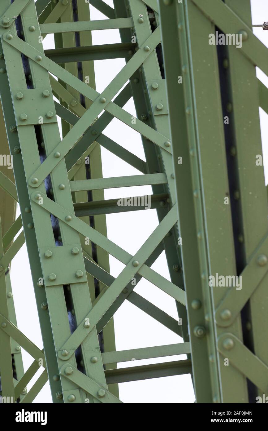 Metal parts of the rivet joints and bolts of the bridge construction ...