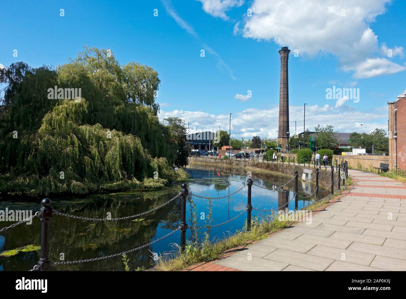 Footpath along the River Foss and former industrial chimney for refuse ...