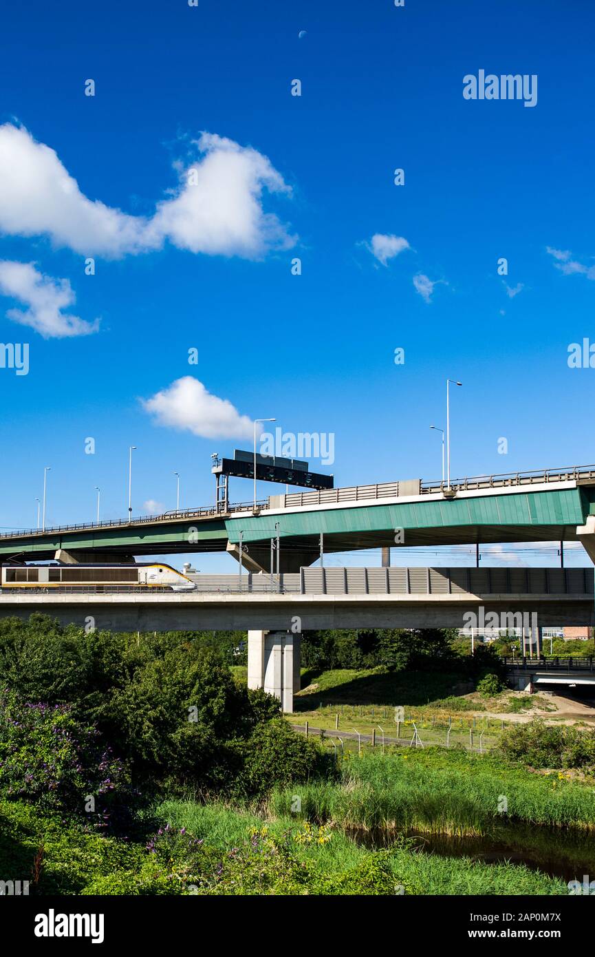 Eurostar train passes underneath the Queen Elizabeth II bridge en route ...
