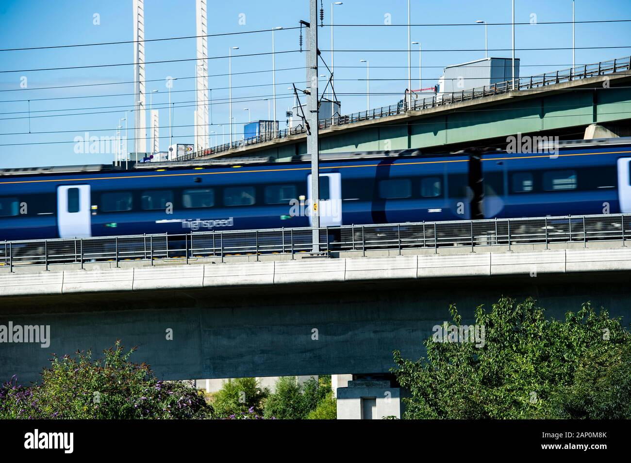 High speed train passing beneath the Queen Elizabeth II Bridge also ...