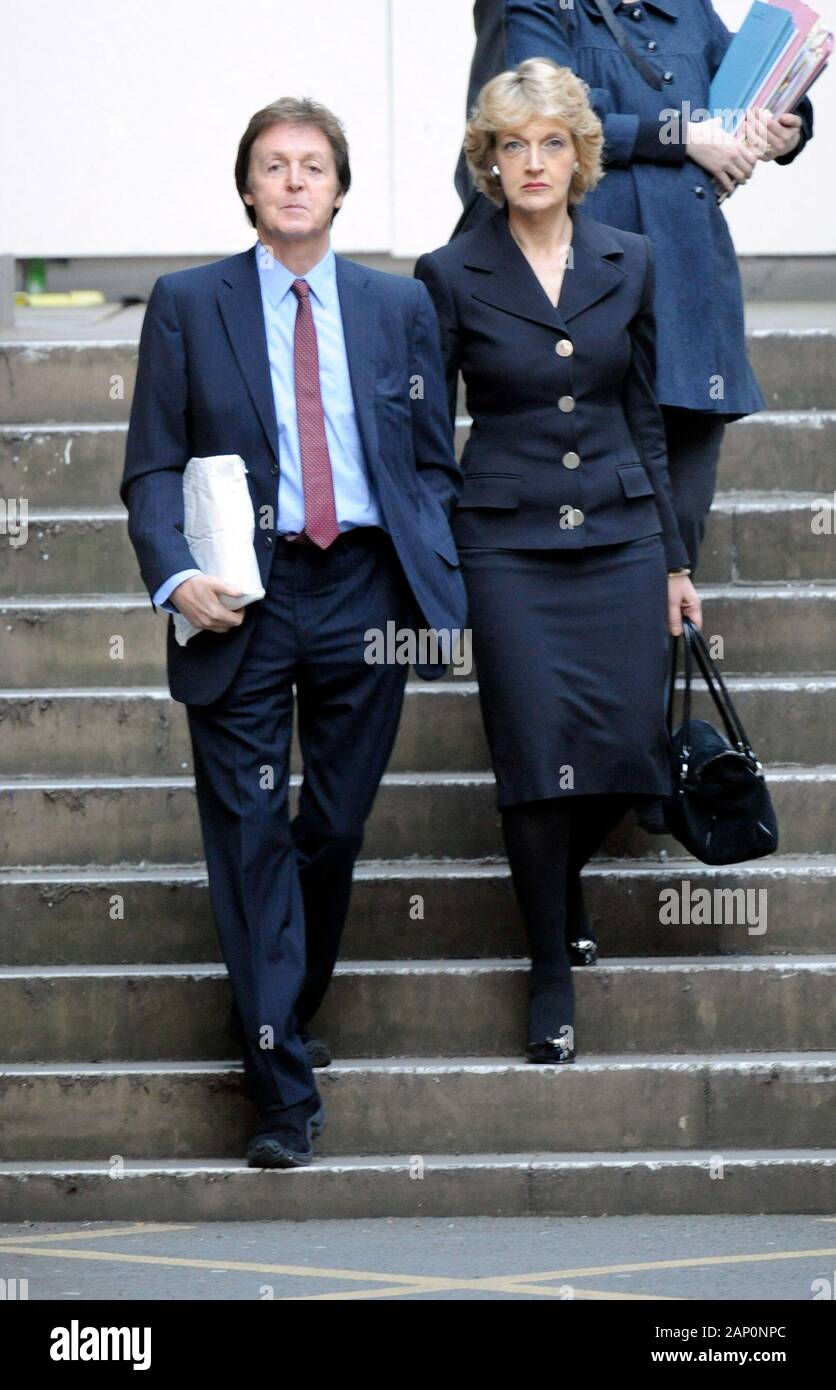 Sir Paul McCartney leaving the high Court in London with barrister ...