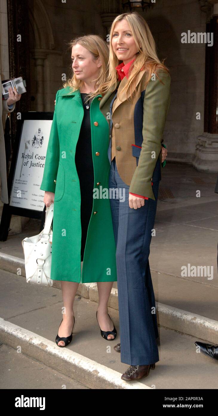 Heather Mills with her sister Fiona leaving the High Court In London following a judgement on ...