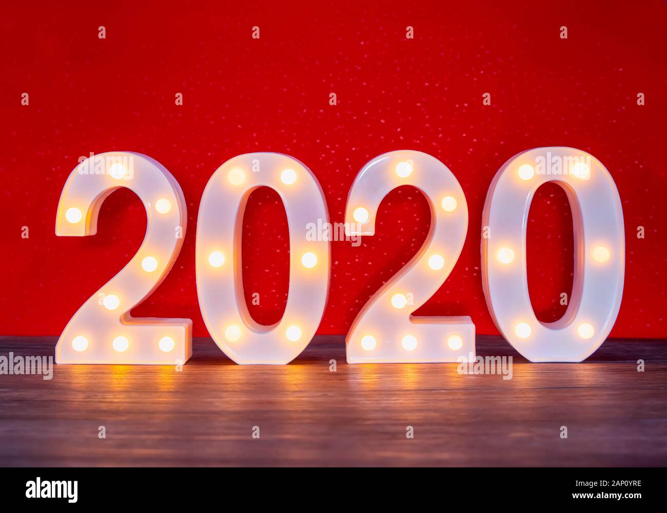 New Year bright light bulb numbers 2020 Stock Photo - Alamy