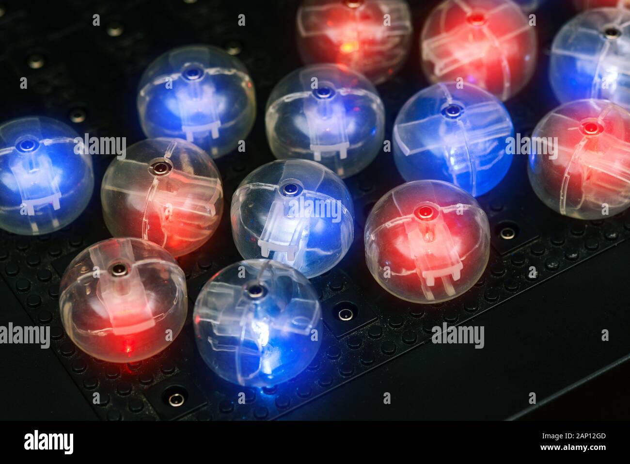 Colored luminous bulbs. Abstract lights background. Glowing light bulb ...