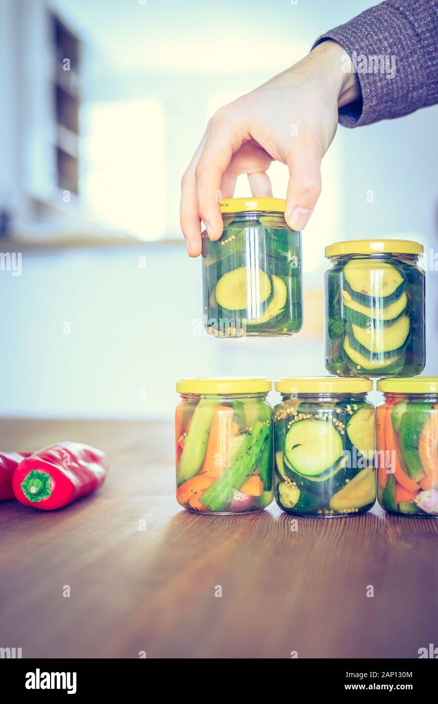 Preserving and conserving a variety of vegetables in glasses Stock ...