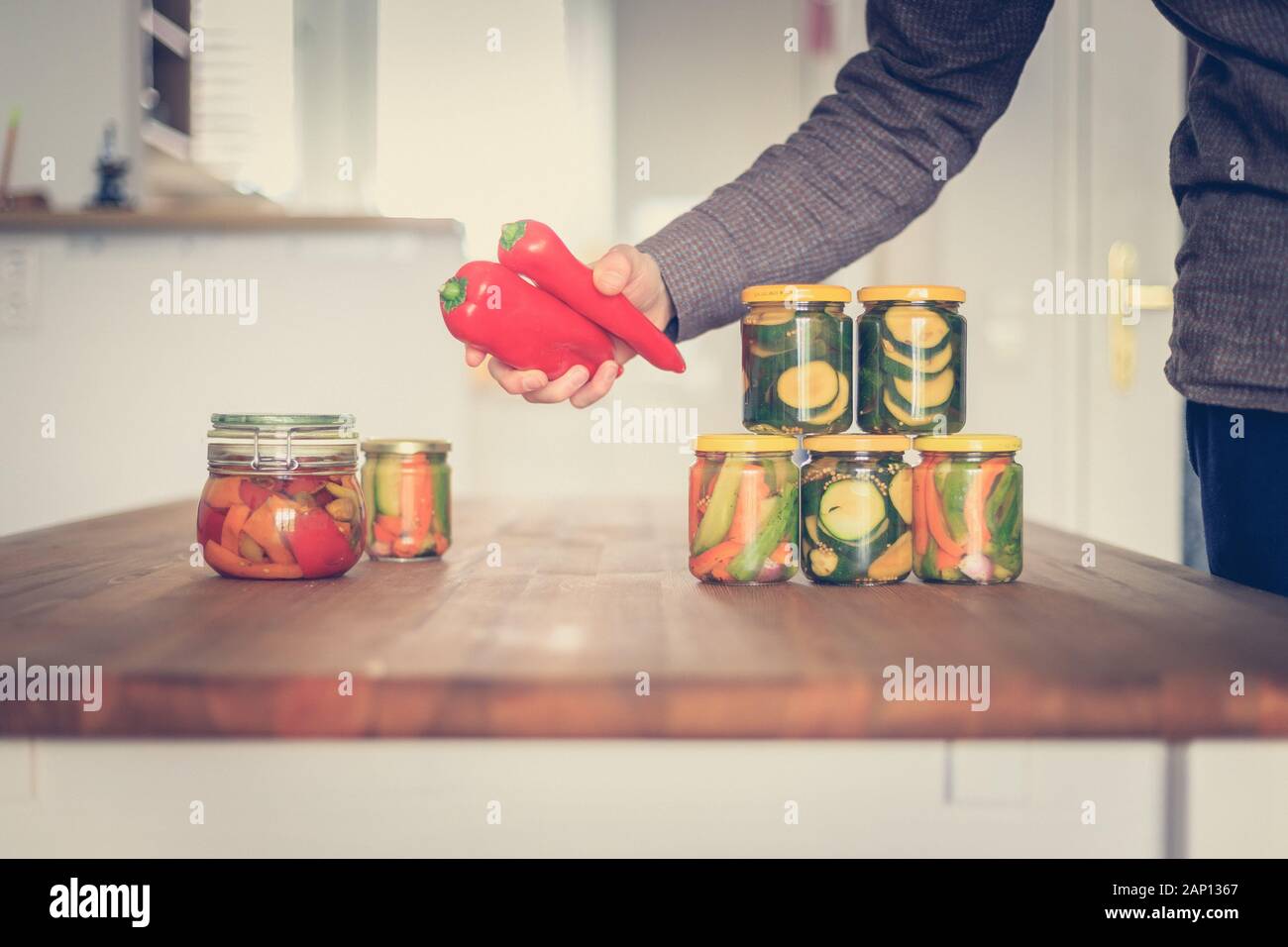 Preserving and conserving a variety of vegetables in glasses Stock ...