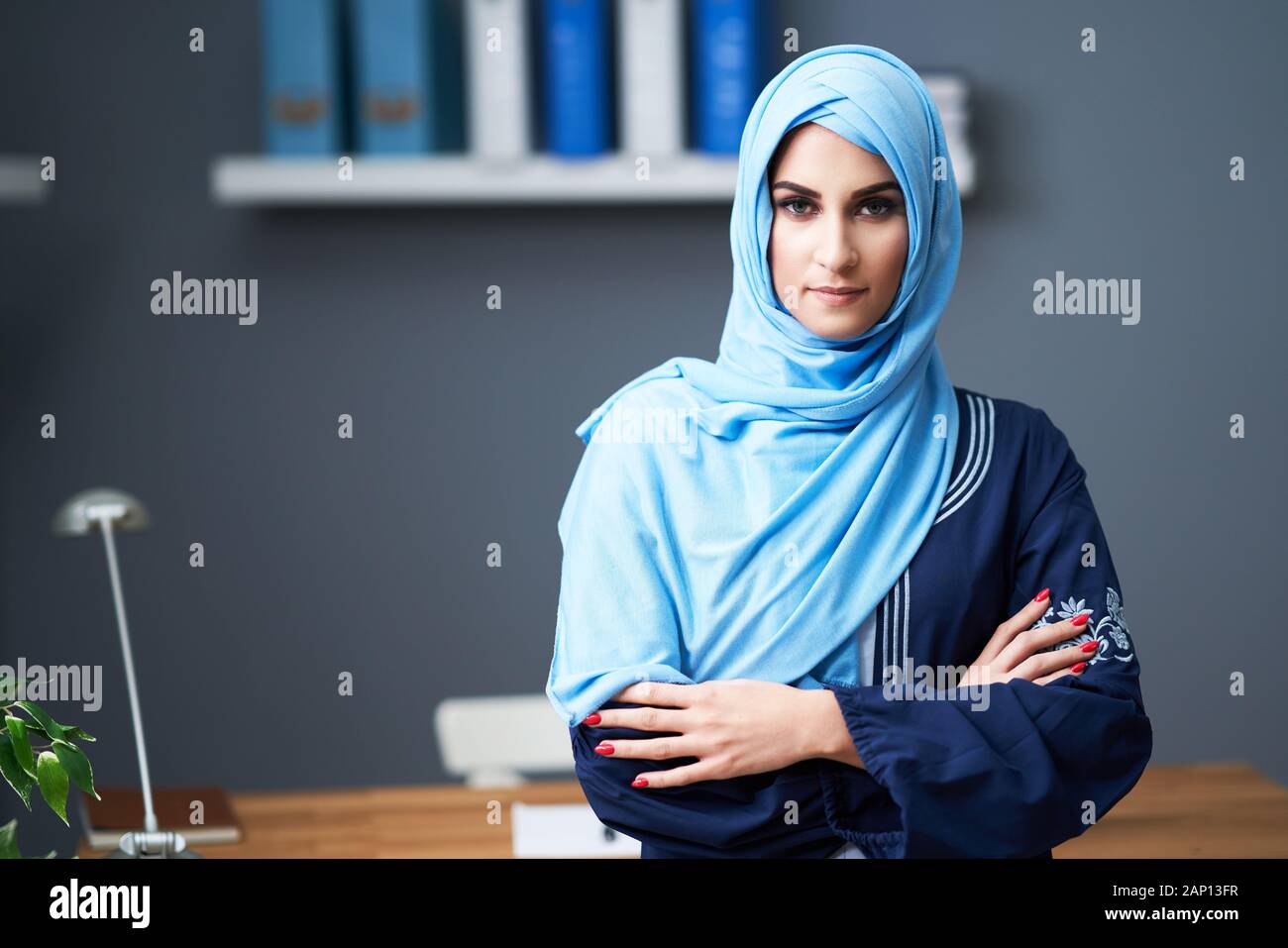 Muslim female student learning at home Stock Photo - Alamy