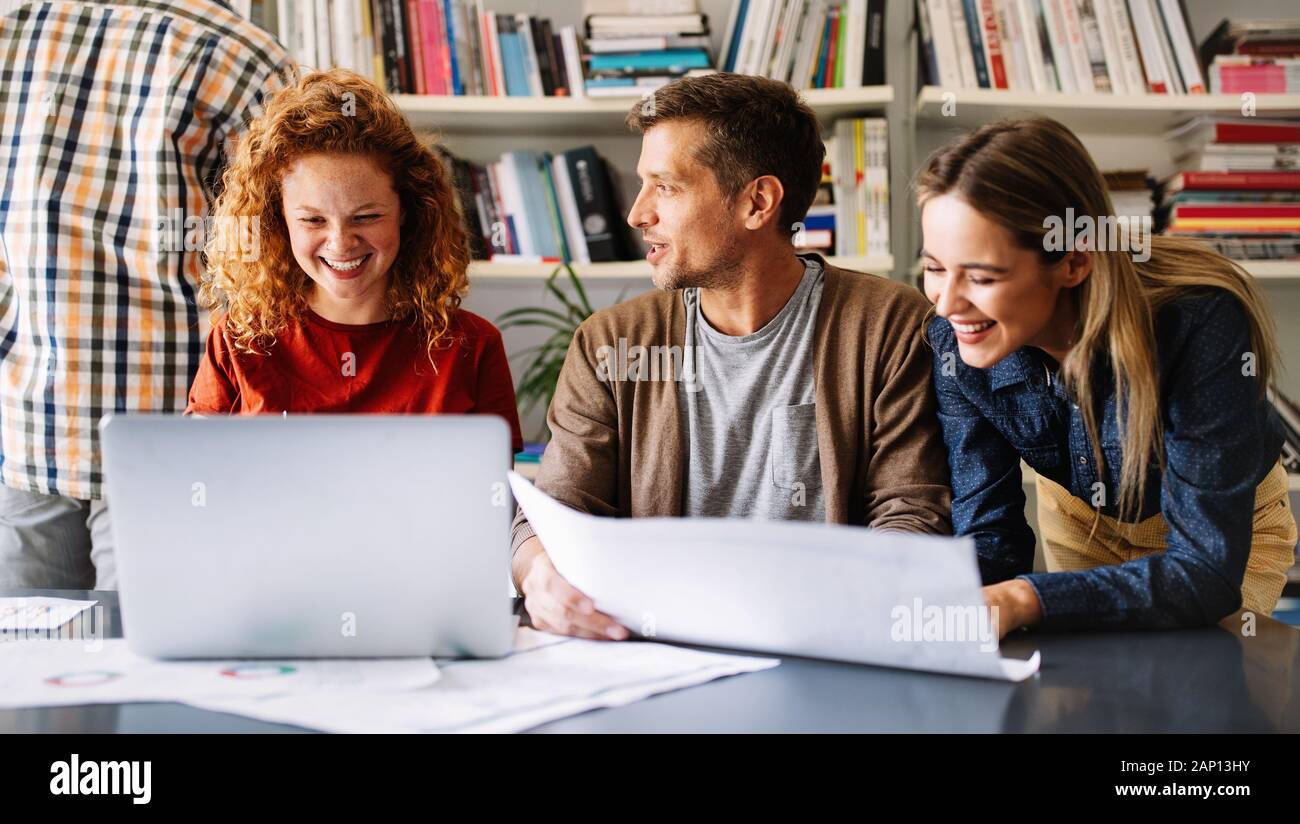 Successful group of designers, business people at work in office Stock ...