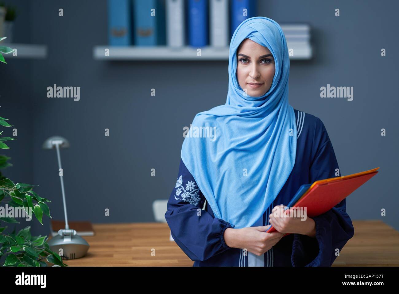 Muslim female student learning at home Stock Photo - Alamy