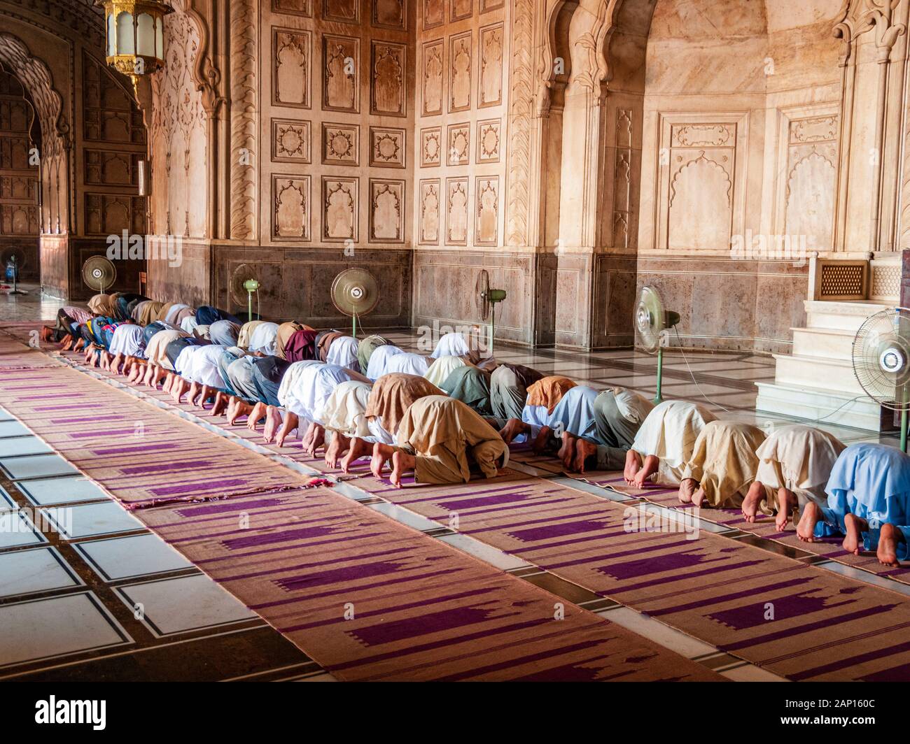 Muslims praying inside Jama Mashid in Lahore, one of the largest ...