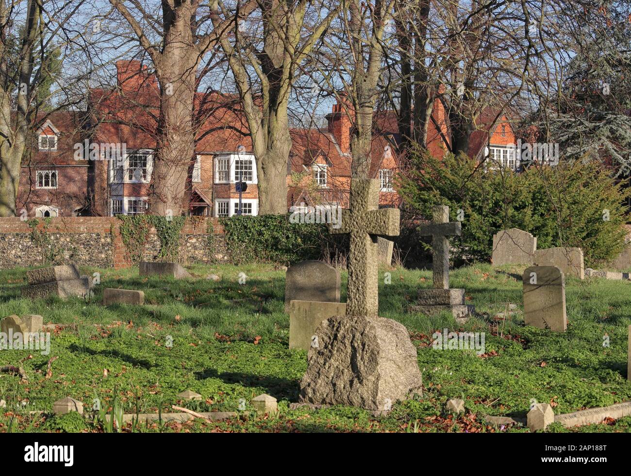 English Village Churchyard at Goring on Thames with houses behind Stock ...