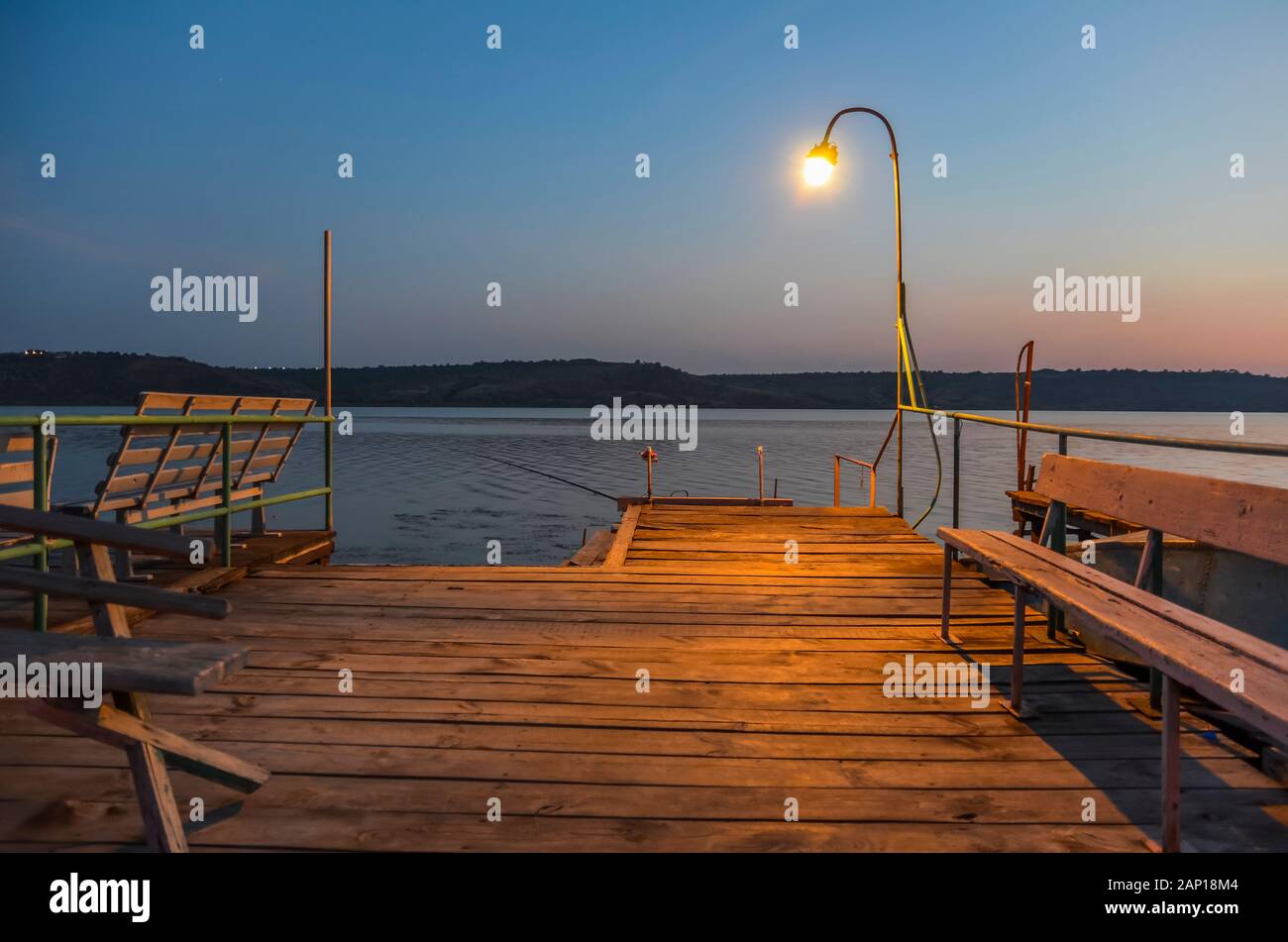 Calm spring lake wooden pier hi-res stock photography and images - Alamy