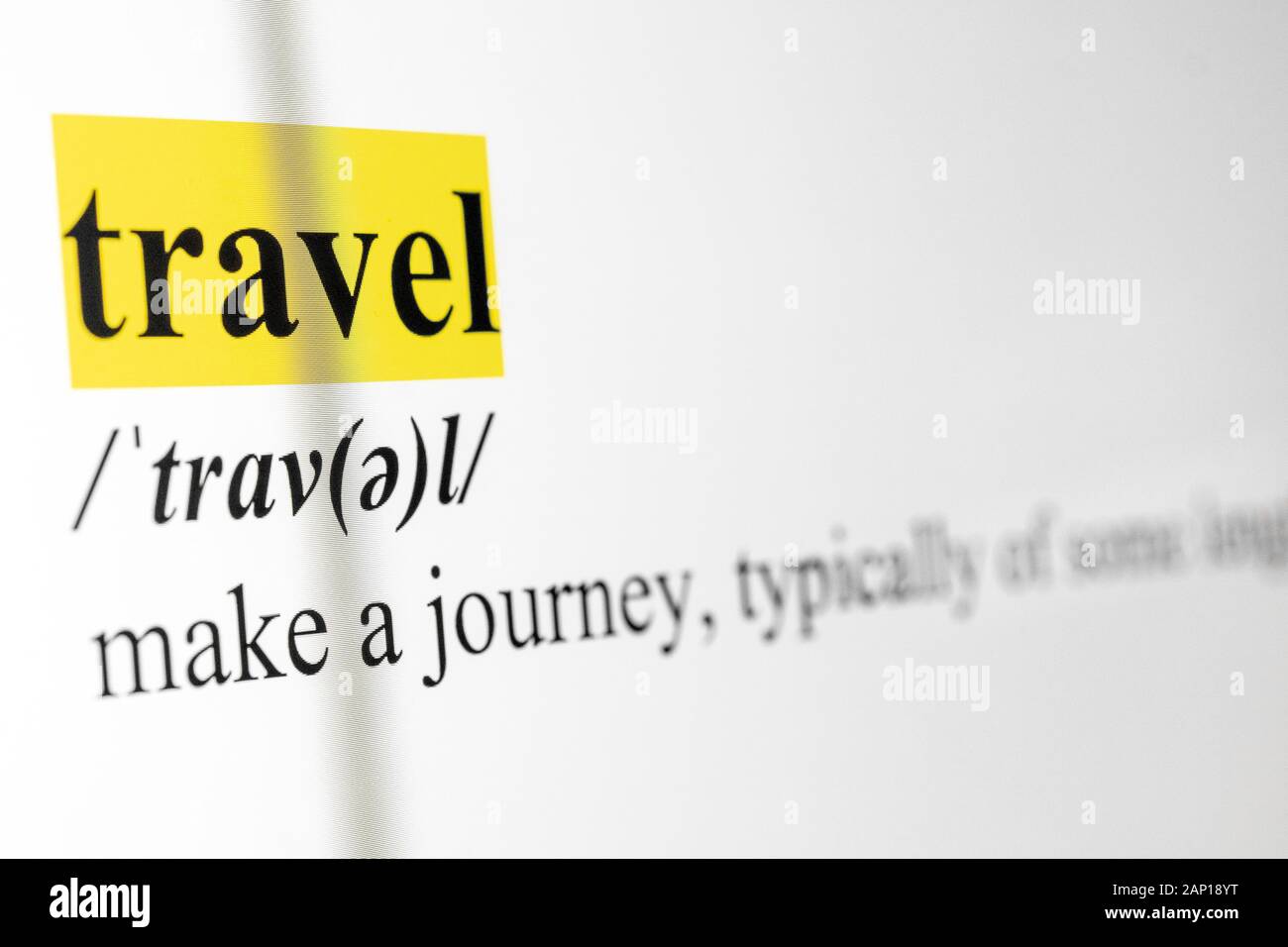 Highlighted text of "Travel" with description and phonetic respelling ...