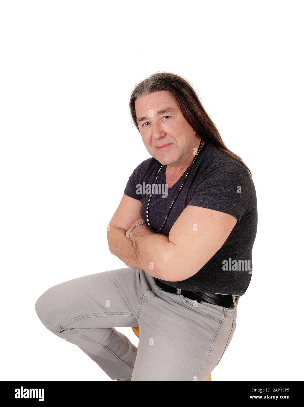 A middle age indigenous man in a portrait picture wearing a black shirt ...