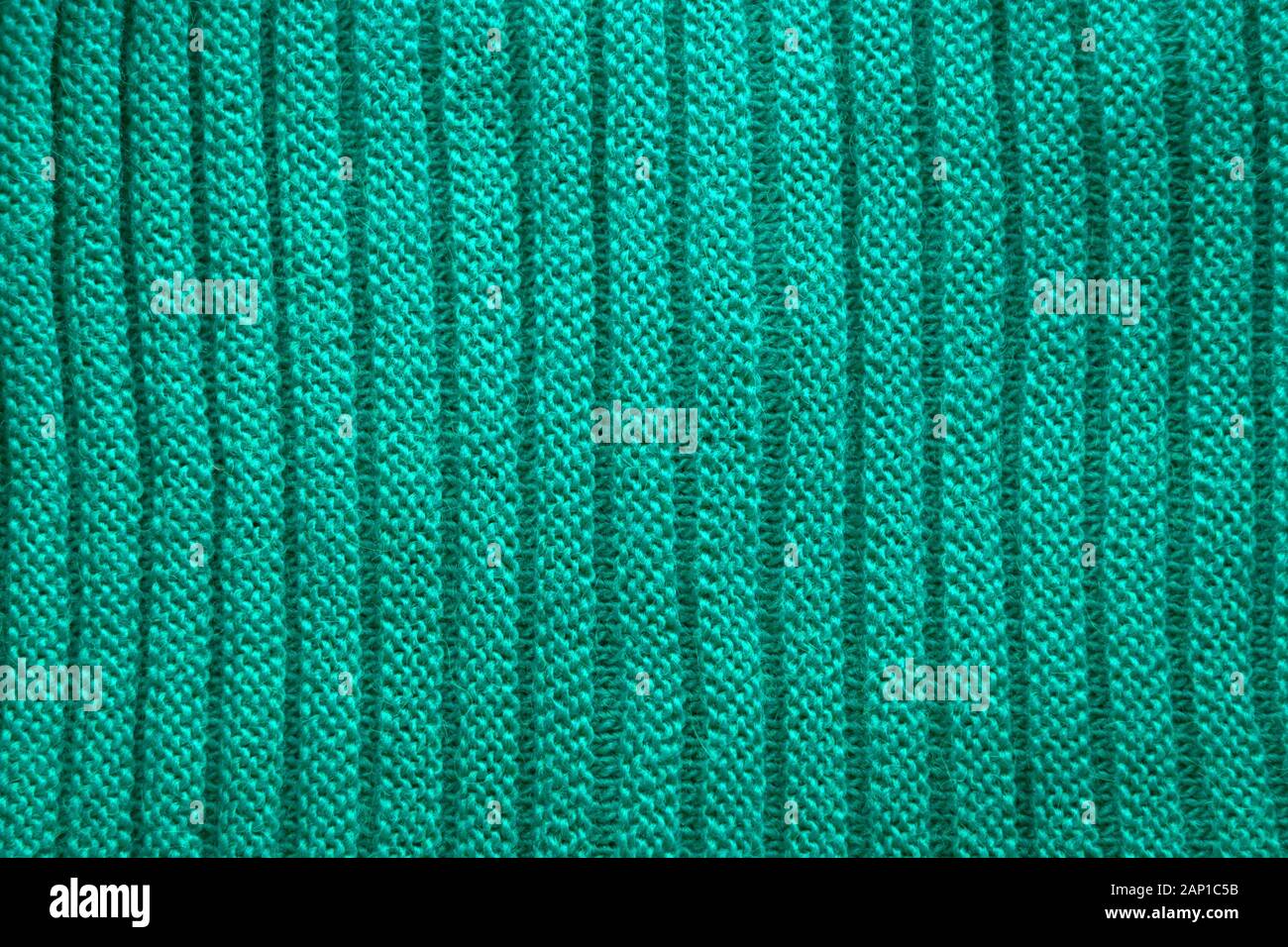 Knitting in green. Knitted background. Knitted texture. Knitting ...