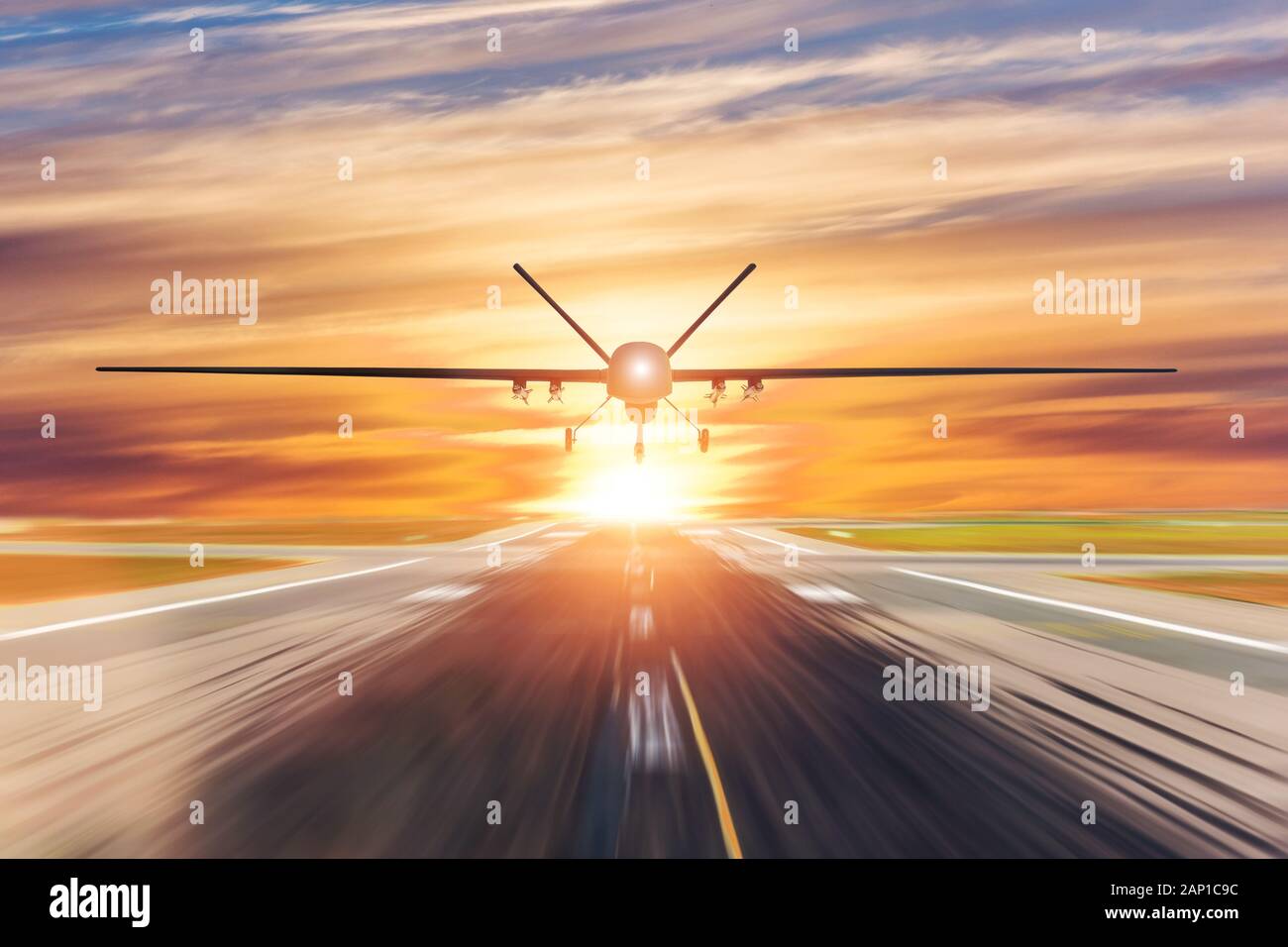 Military unmanned aerial vehicle takes off from runway at a military ...