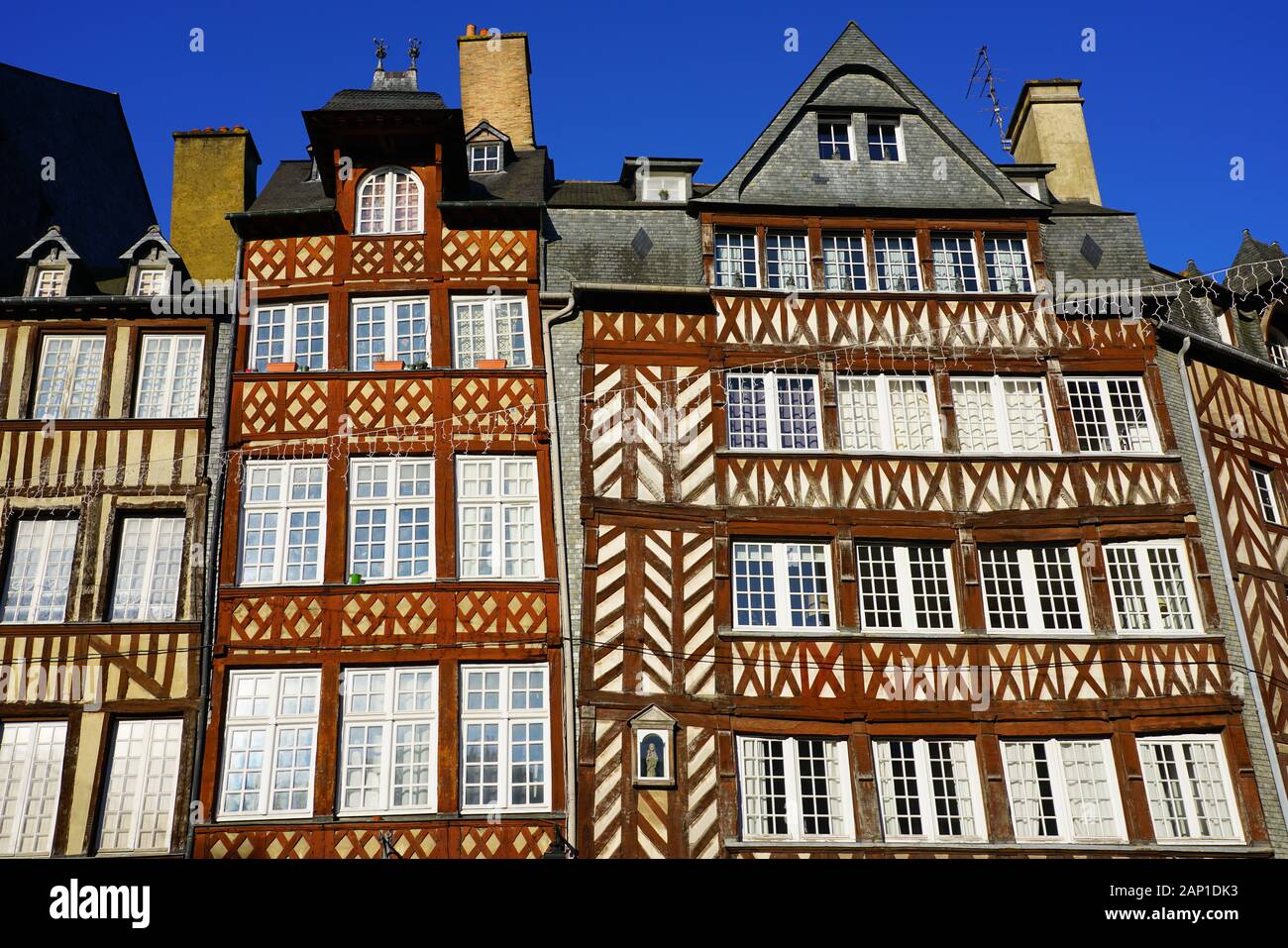 RENNES, FRANCE -28 DEC 2019- Colorful medieval Normandy-style buildings ...