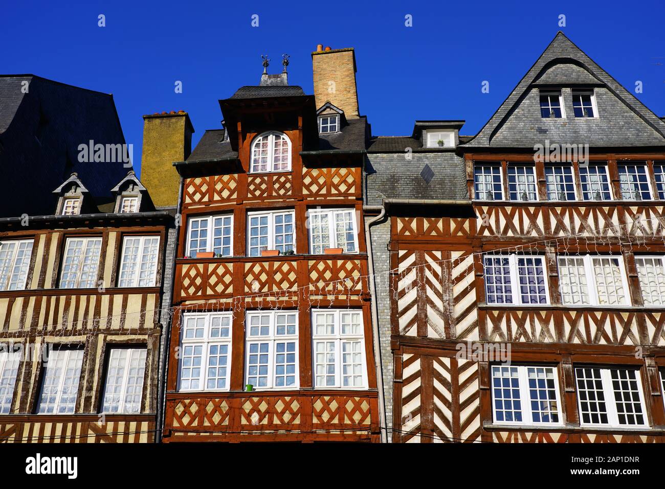 RENNES, FRANCE -28 DEC 2019- Colorful medieval Normandy-style buildings ...