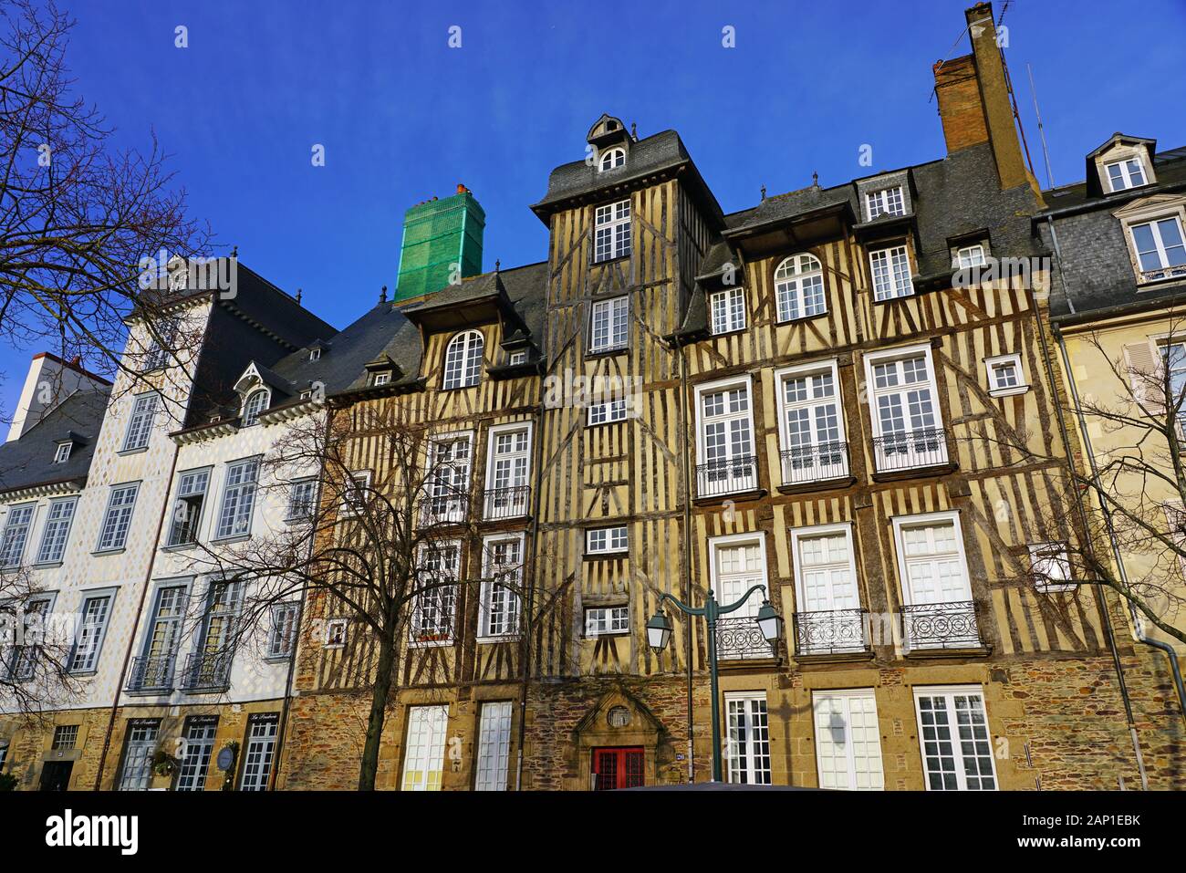 RENNES, FRANCE -28 DEC 2019- Colorful medieval Normandy-style buildings ...