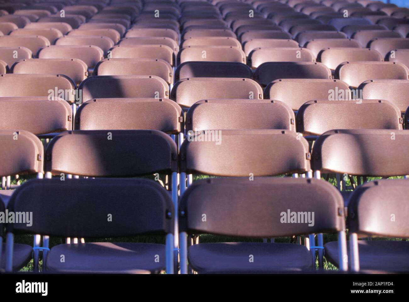 Rows of folding chairs waiting for an audience Stock Photo - Alamy