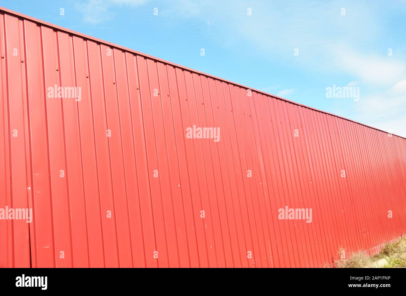 Close up on house red metal fence with blue sky and copy space Stock ...