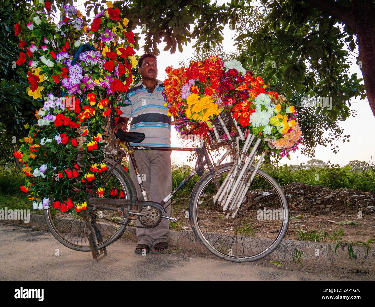 Asian man selling flowers hi-res stock photography and images - Alamy